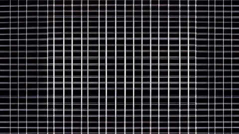 A black and white screen with a grid pat... | Stock Video | Pond5