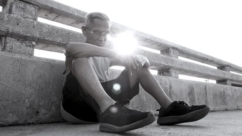 Black and white tone of tired Asian seni... | Stock Video | Pond5