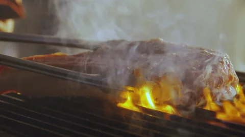 Black Angus Wagyu Tomahawk Steak on Char... | Stock Video | Pond5