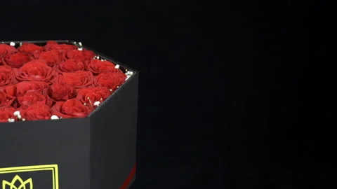 Black box of red roses slider shot black... | Stock Video | Pond5
