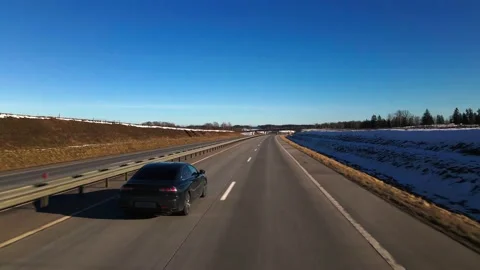 a black car is driving on the motorway, ... | Stock Video | Pond5