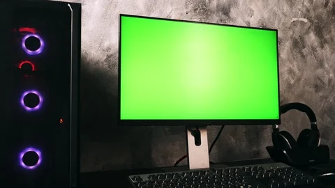 Black computer with green screen monitor... | Stock Video | Pond5