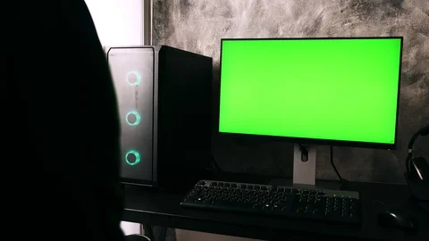 Black computer with green screen monitor... | Stock Video | Pond5