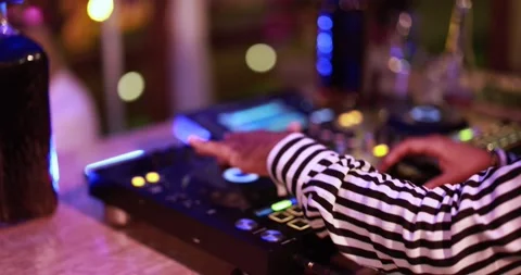 Black Dj playing music at cocktail bar o... | Stock Video | Pond5