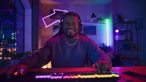 Black Gamer Playing Video Game at Home | Stock Video | Pond5