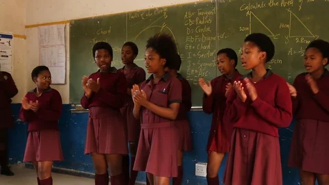 Black girls sing and clap together in Af... | Stock Video | Pond5