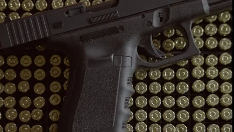 Black glock handgun pistol with bullets ... | Stock Video | Pond5