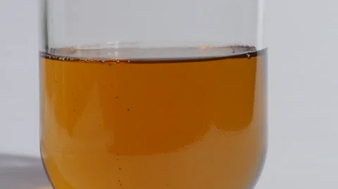 Black Ink Falling into Fresh Motor Oil S... | Stock Video | Pond5