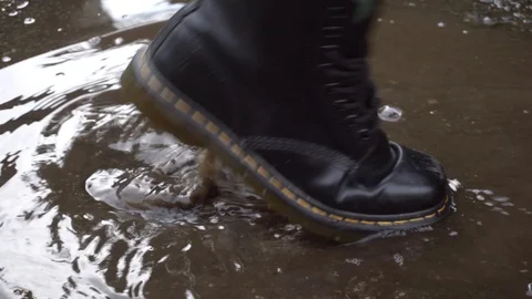 Boot Puddle Dirt Stock Footage ~ Royalty Free Stock Videos | Pond5