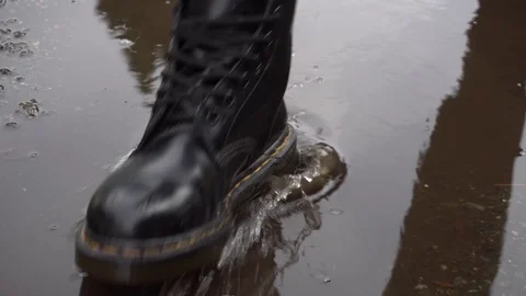 Boot Puddle Dirt Stock Footage ~ Royalty Free Stock Videos | Pond5