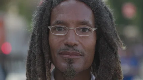 Black man with dreadlock hair serious an... | Stock Video | Pond5