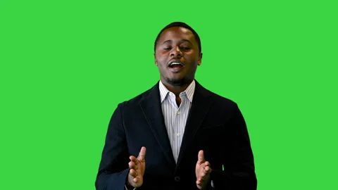 Black man in a suit explaining on camera... | Stock Video | Pond5