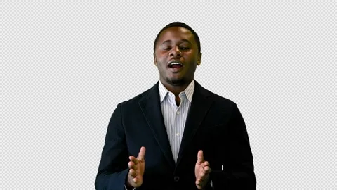Black man in a suit explaining on camera... | Stock Video | Pond5