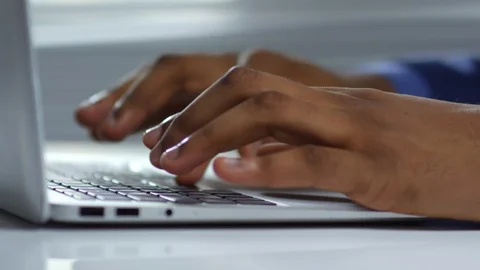 Black Man Typing on Laptop Computer | Stock Video | Pond5