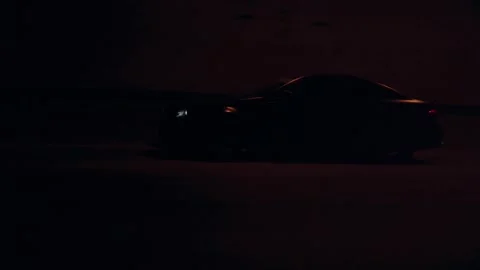 Black Mercedes Benz C63 driving in a dar... | Stock Video | Pond5