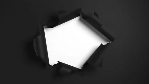 Black paper tearing from center, opening... | Stock Video | Pond5