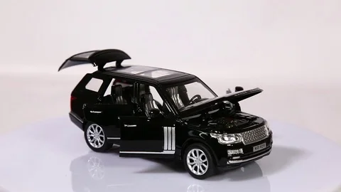 Black Range Rover scale model SUV car wi... | Stock Video | Pond5