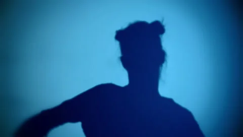 Black silhouette shadow of young woman d... | Stock Video | Pond5