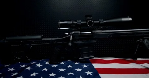 black Sniper Rifle with high powered Sco... | Stock Video | Pond5
