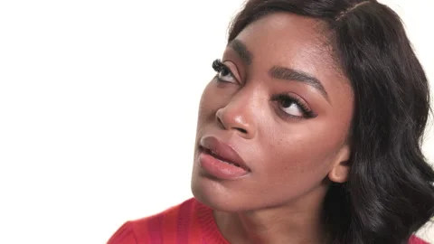 Black woman face looking up solemnly. Is... | Stock Video | Pond5