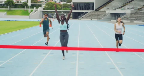 Black woman winning a race and celebrati... | Stock Video | Pond5