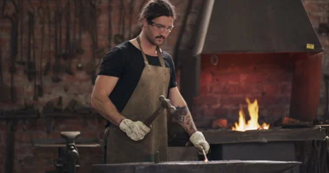Blacksmith, hammer and man on anvil in w... | Stock Video | Pond5