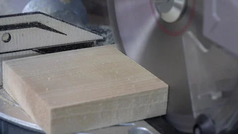 Blade of miter saw to cut off edge of wo... | Stock Video | Pond5