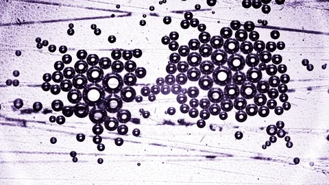 Bleach liquid flowing filmed under a mic... | Stock Video | Pond5