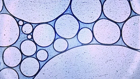 Bleach liquid flowing filmed under a mic... | Stock Video | Pond5