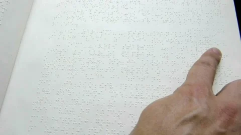 Blind person reading braille text close-... | Stock Video | Pond5