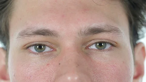 Blinking Eyes of Young Man, Looking in C... | Stock Video | Pond5