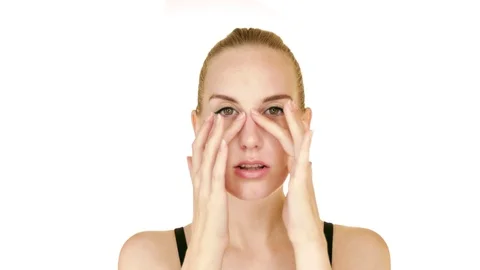 Blond girl fondling the skin of the face... | Stock Video | Pond5