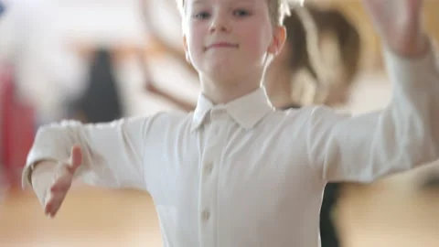 Blond little boy jumping and spinning in... | Stock Video | Pond5