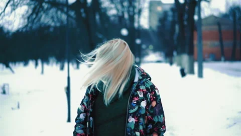 Blonde cowards with her hair in slow mot... | Stock Video | Pond5