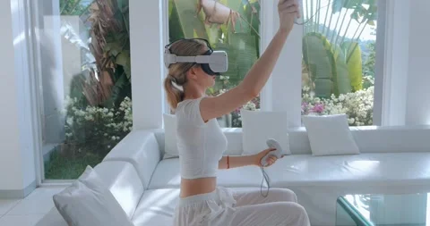 Blonde woman in virtual reality simulati... | Stock Video | Pond5