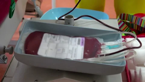 blood bag in a blood collection mixer ma... | Stock Video | Pond5