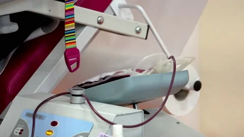 blood bag in a blood collection mixer ma... | Stock Video | Pond5