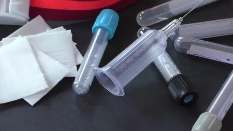 Blood collection sets and syringes in la... | Stock Video | Pond5