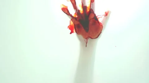Bloody hand on glass window | Stock Video | Pond5