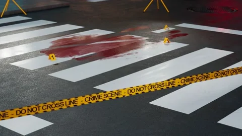 A bloody stain on a street. The crime sc... | Stock Video | Pond5
