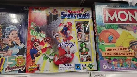 Blow Up Shaky Tower Card Game Mario and ... | Stock Video | Pond5
