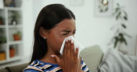 Blowing nose, sick and woman in living r... | Stock Video | Pond5