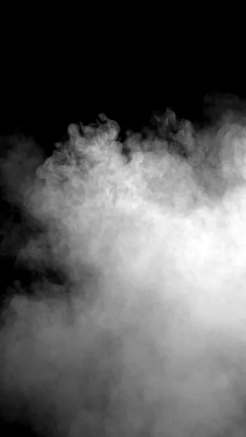 Blowing smoke into the frame, black back... | Stock Video | Pond5
