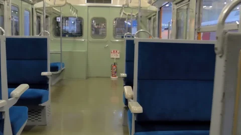 The blue bench chairs inside the train i... | Stock Video | Pond5
