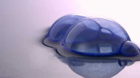 Bubbles Popping Stock Footage ~ Royalty Free Stock Videos | Pond5