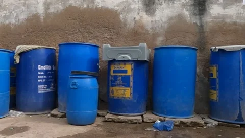 Blue color containers filled with water ... | Stock Video | Pond5