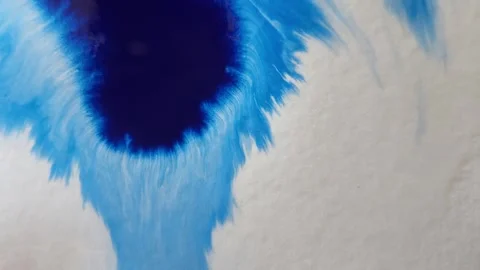 Blue color inks spreading out over wet p... | Stock Video | Pond5