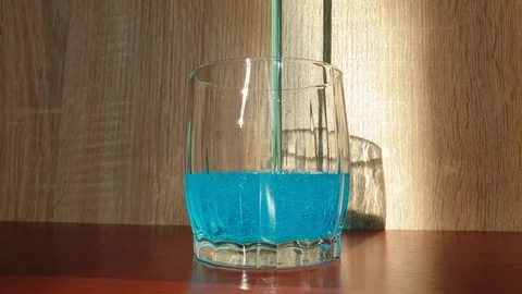 Blue drink. Blue water with bubbles. Blu... | Stock Video | Pond5