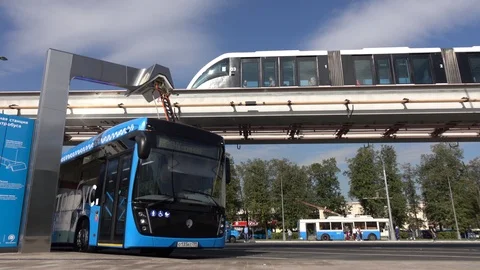 Blue electric bus at the charging statio... | Stock Video | Pond5