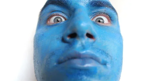 Blue face man opening and closing his ey... | Stock Video | Pond5